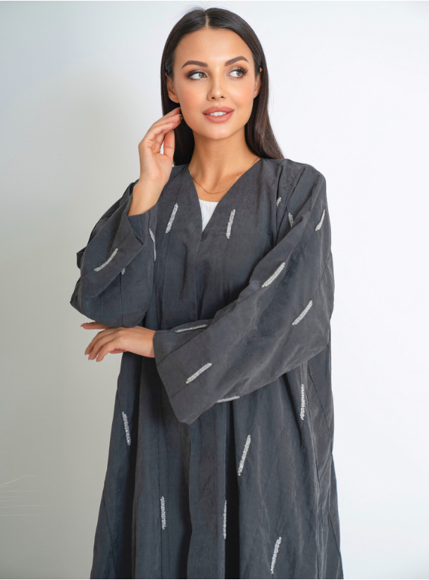 Grey abaya Grey suede abaya with embellishments. Abayas from ALIA ABAYAA at Boksha