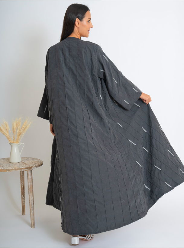 Grey abaya Grey suede abaya with embellishments. Abayas from ALIA ABAYAA at Boksha
