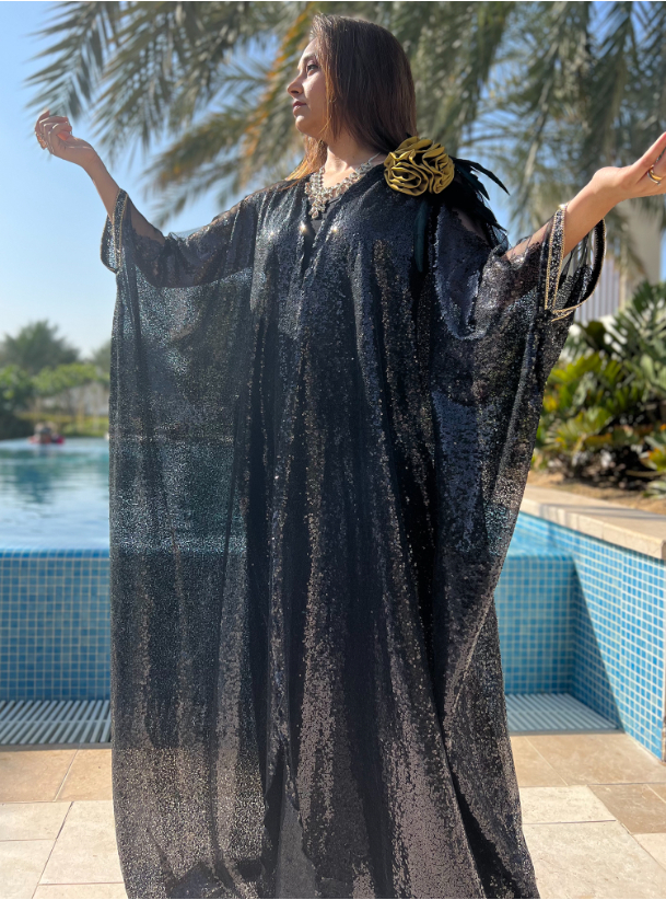 Bling black Sequined black abaya with flower brooch applique. Abayas from Roua Designs at Boksha