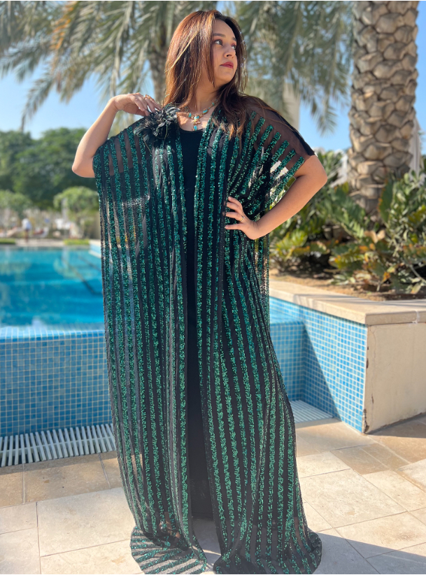 Bling green Sequined black abaya with green sequins and flower brooch applique. Abayas from Roua ...