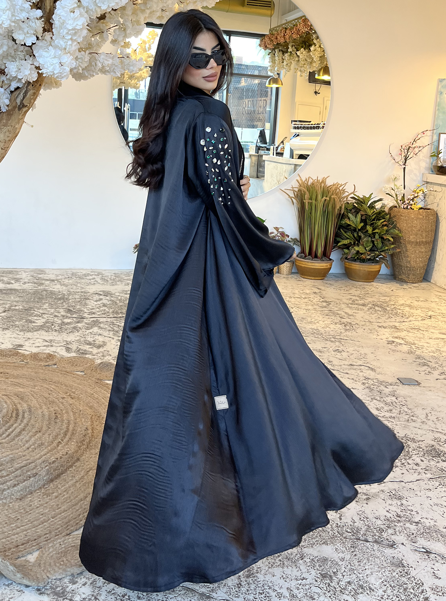 BejewelledAbaya Black flowy abaya with bejewelled sleeves. Comes with a ...