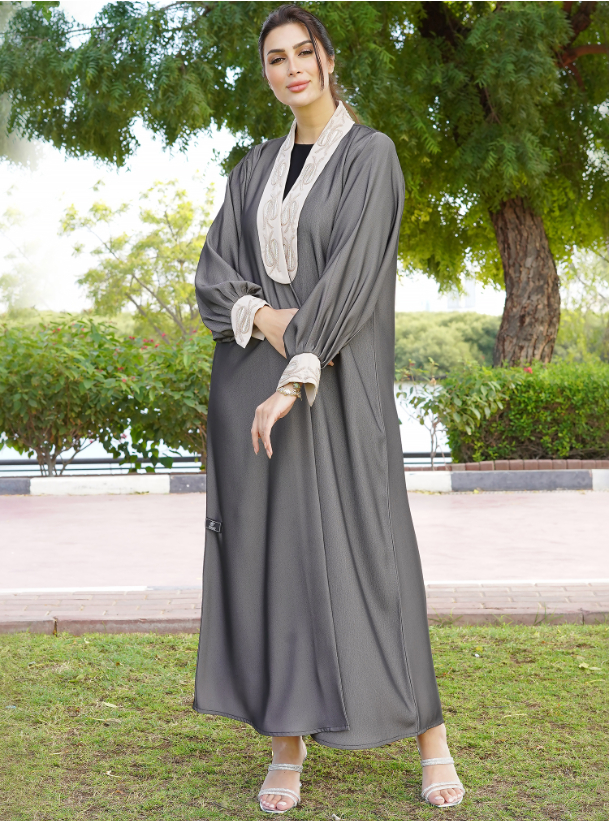 A-29 Abaya Dark grey collar abaya with cuffed sleeves, adorned with embellishments. Comes with a ...