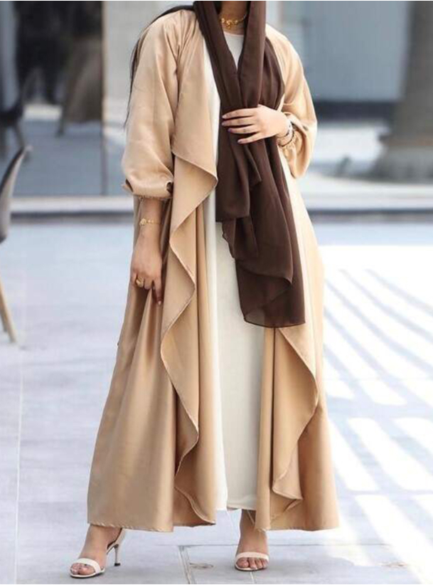 Golden abaya Matte gold abaya with waterfall trimmings. Comes with a headscarf. Abayas from ...