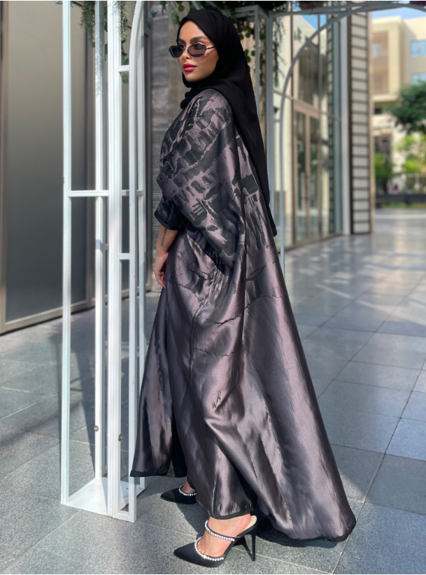 Double Side A two-sided abaya offers versatile and reversible styling options in one garment ...