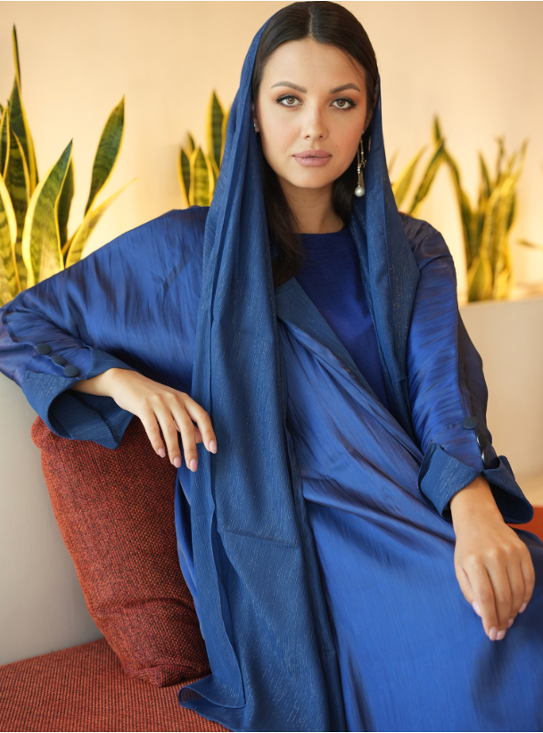 Blue abaya The blue abaya is dubbled with a blue glitter fabric which ...