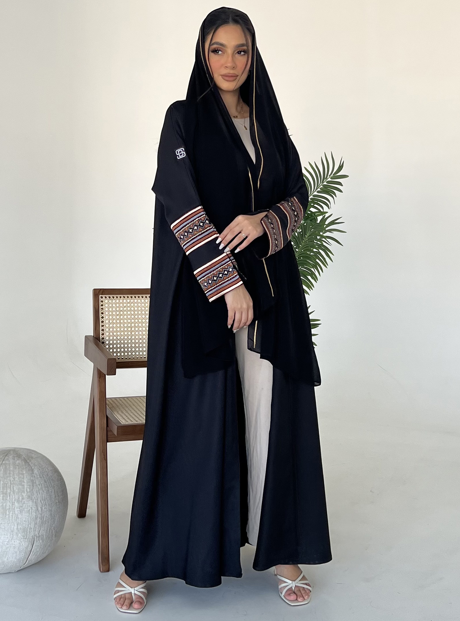Embroi Abaya Black crepe abaya with embroidered sleeves. Comes with a ...