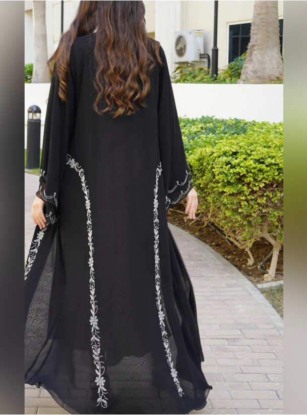 Black Abaya Elegant black abaya with embroidery. Comes with a headscarf ...
