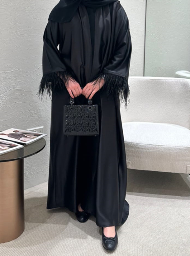 PTASHKA Black, but with a special design of feathers, to add a special ...