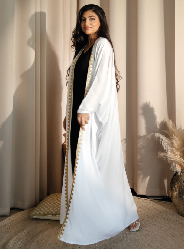 C0015 White Long bisht with a full-length gold border design. Abayas ...