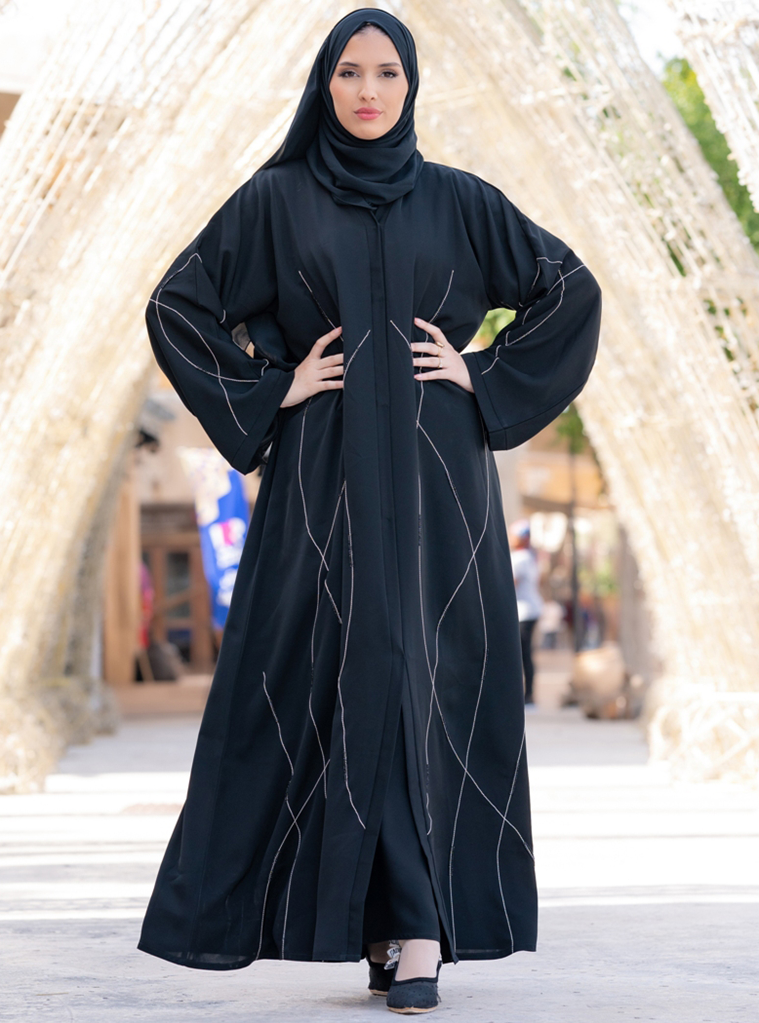 N3A Abaya A truly majestic abaya of stunning design handwork embellishments. Abayas from nukhbaa ...