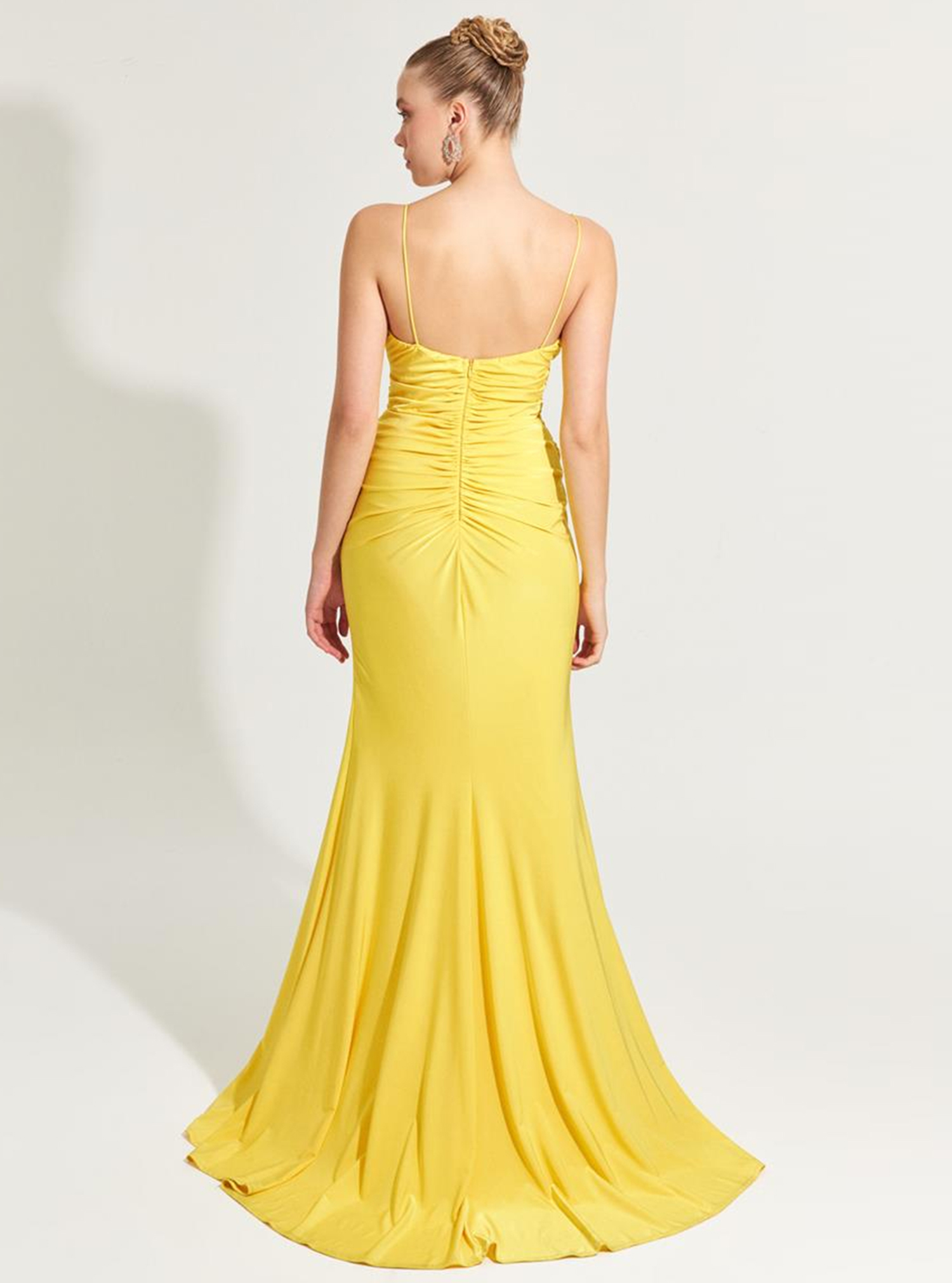 Yellow Dress A yellow spaghetti strap V neck long dress with center ...