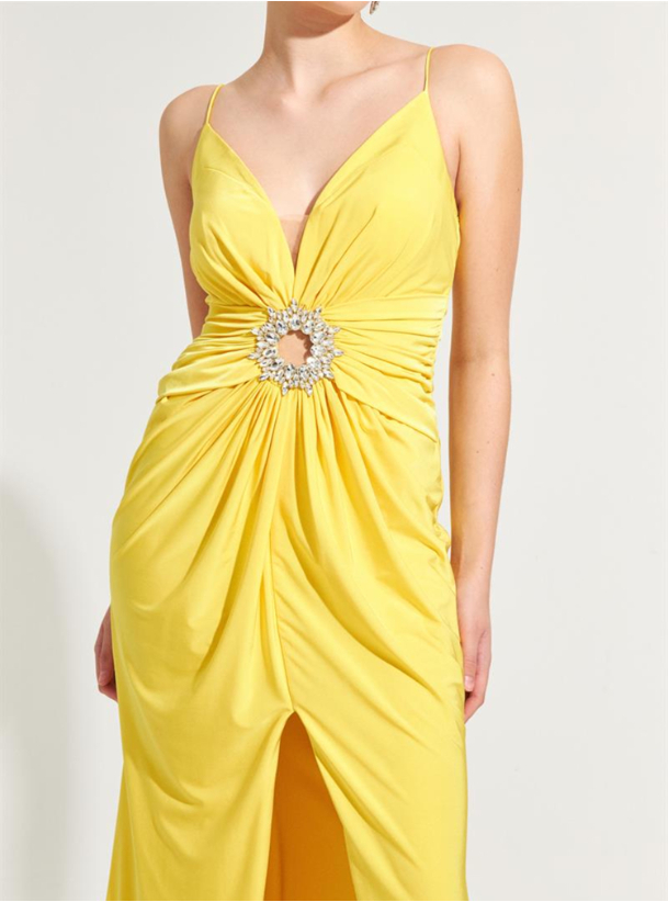 Yellow Dress A yellow spaghetti strap V neck long dress with center ...