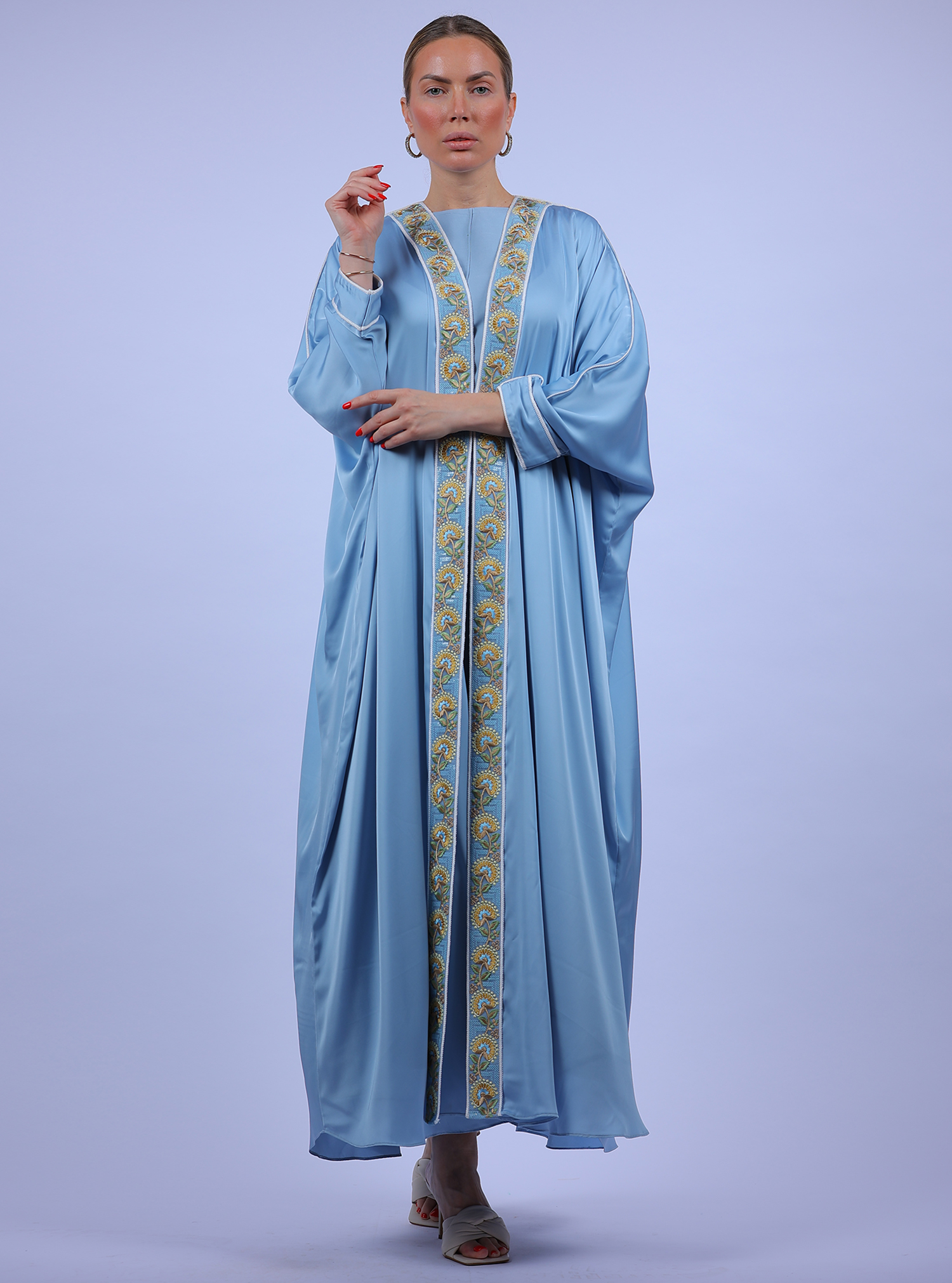Silk abaya A silk abaya decorated with withe threads and luxurious ...