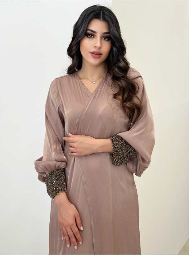 Beige Organza Beige organza abaya with cuffed sleeves, adorned with ...