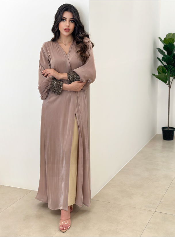 Beige Organza Beige organza abaya with cuffed sleeves, adorned with ...