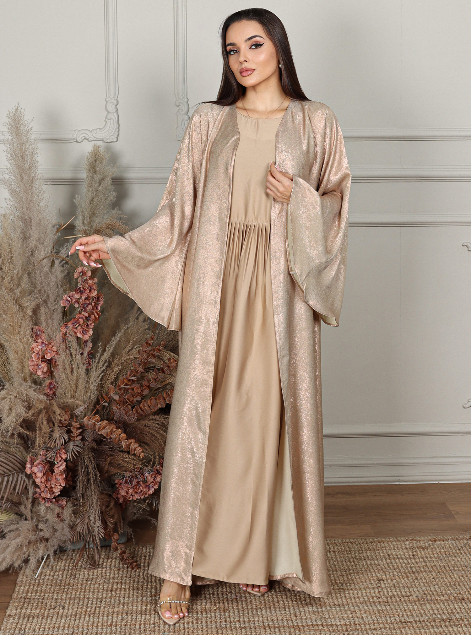 Gold abaya shimmering abaya in a gold shade in a flare pattern along with pleated silk inner ...