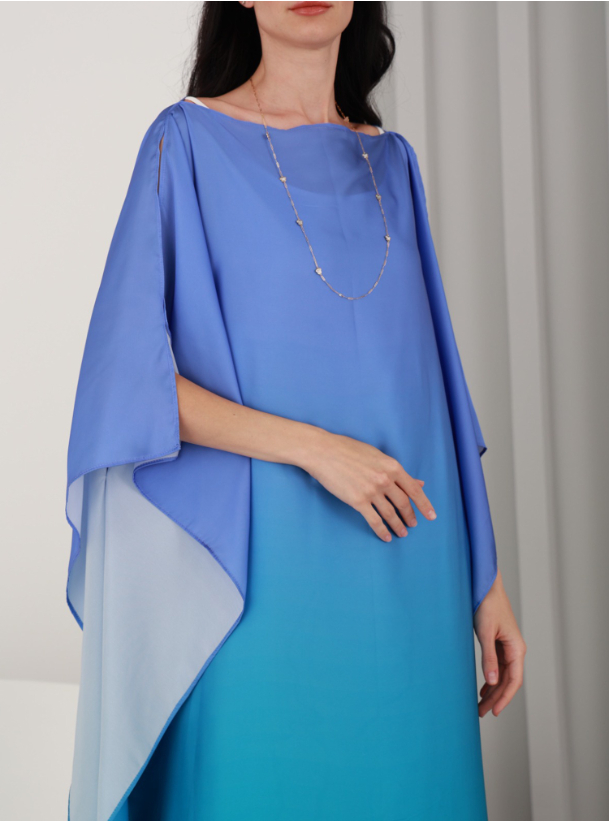 Muhra Kaftan Muhra kaftan features a loose and flowy silhouette, with a ...