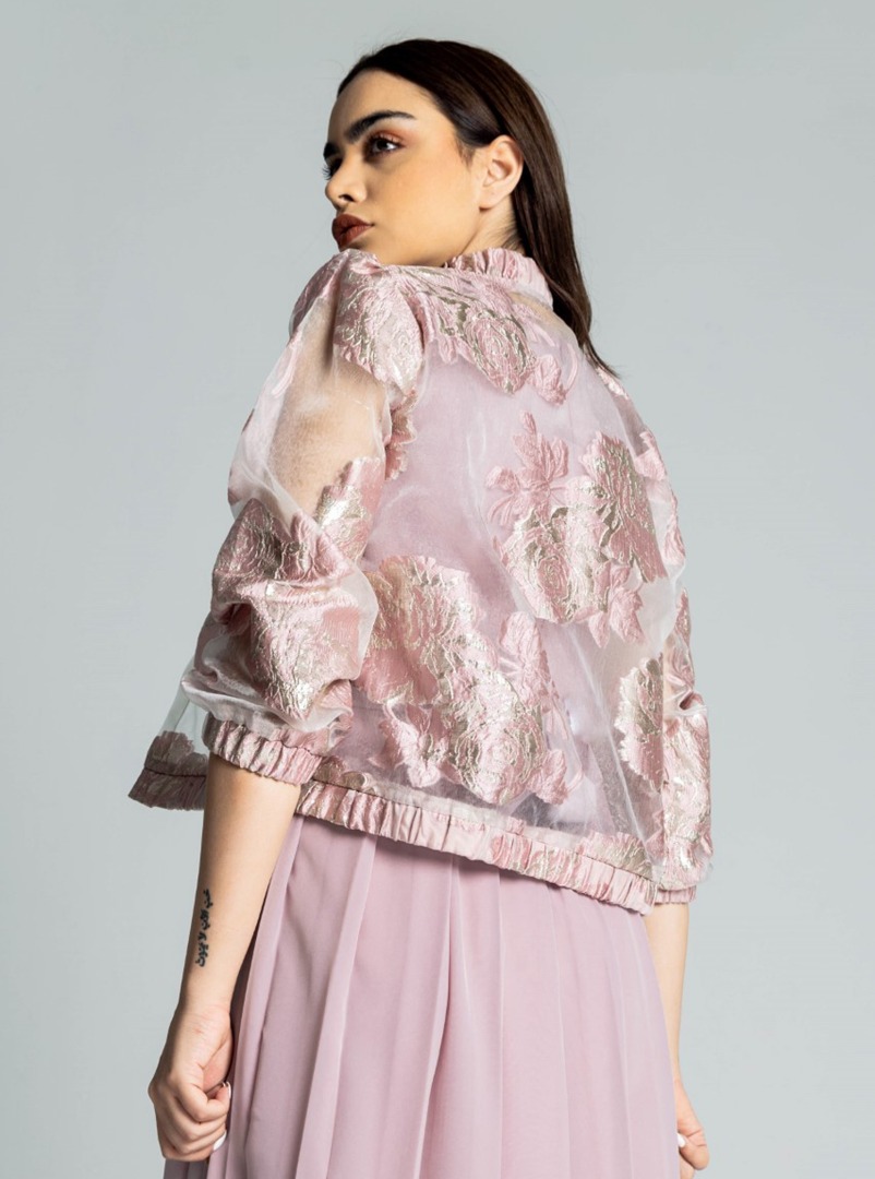 Chique Dress A pink pleated dress with bomber jacket completes your ...