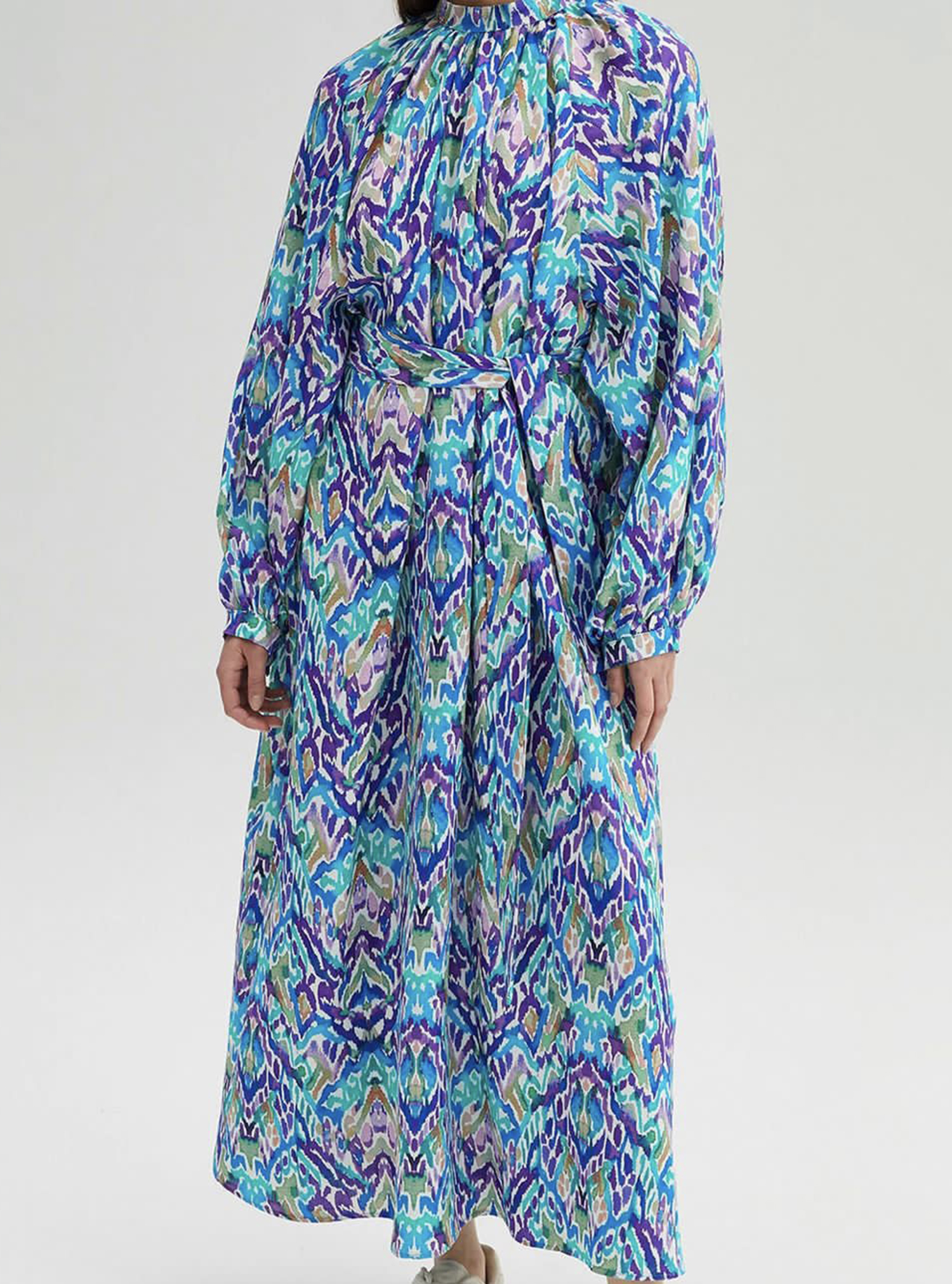 Patterned Blue Patterned blue dress with billowy sleeves. Comes with a ...