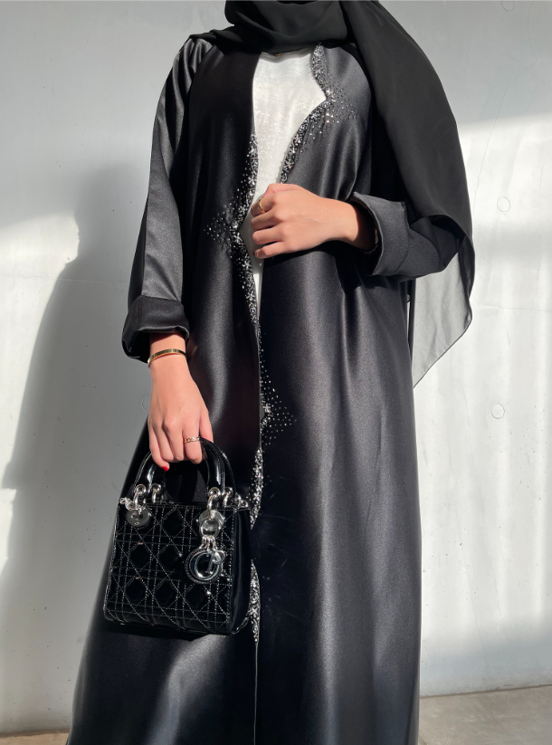 S009 Abaya Black satin abaya with embellished scallop trimmings. Comes with a headscarf. Abayas ...
