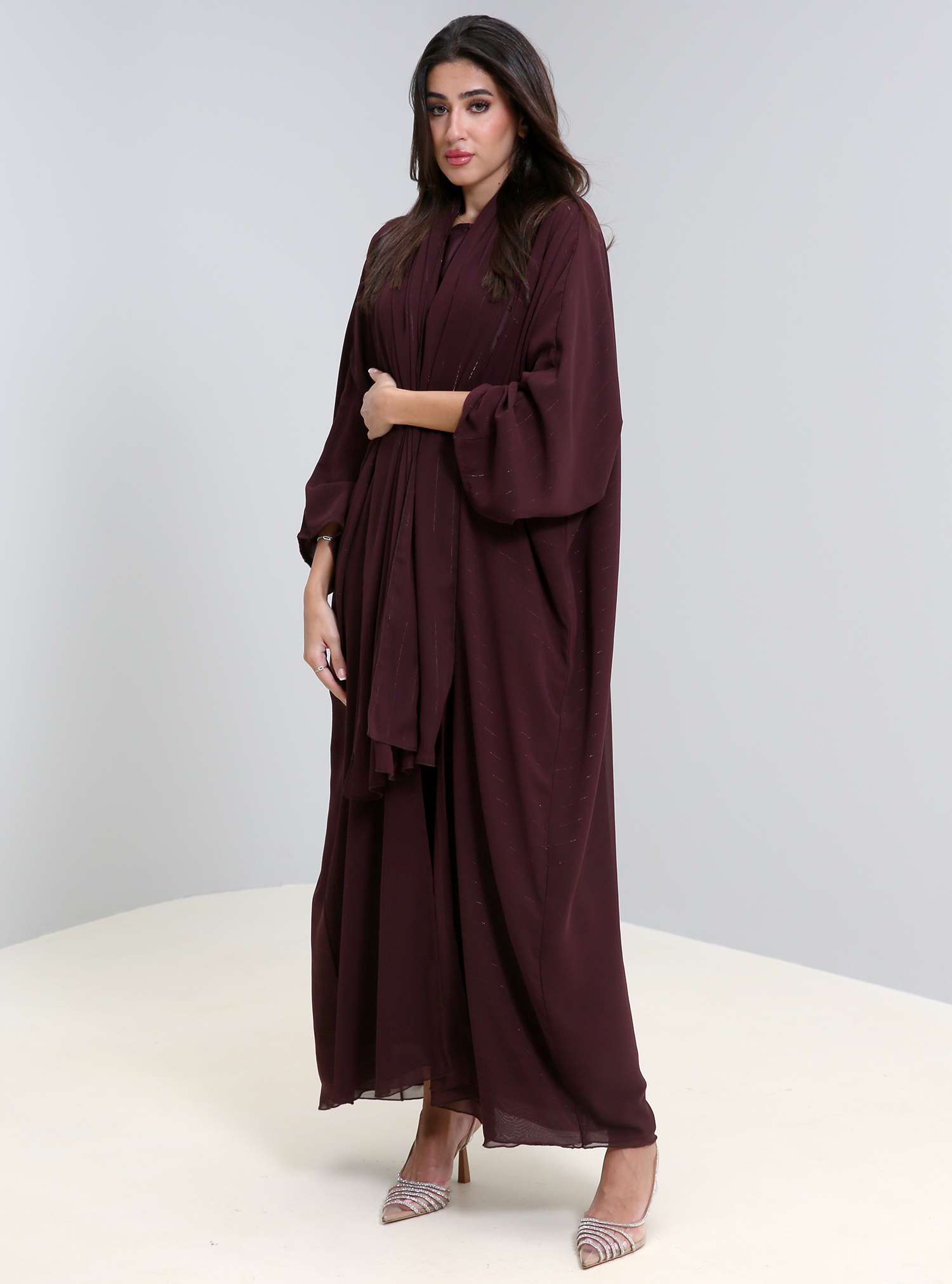 ATA-073 Abaya Bisht Chiffon Maroon abaya with metallic line patterns ...