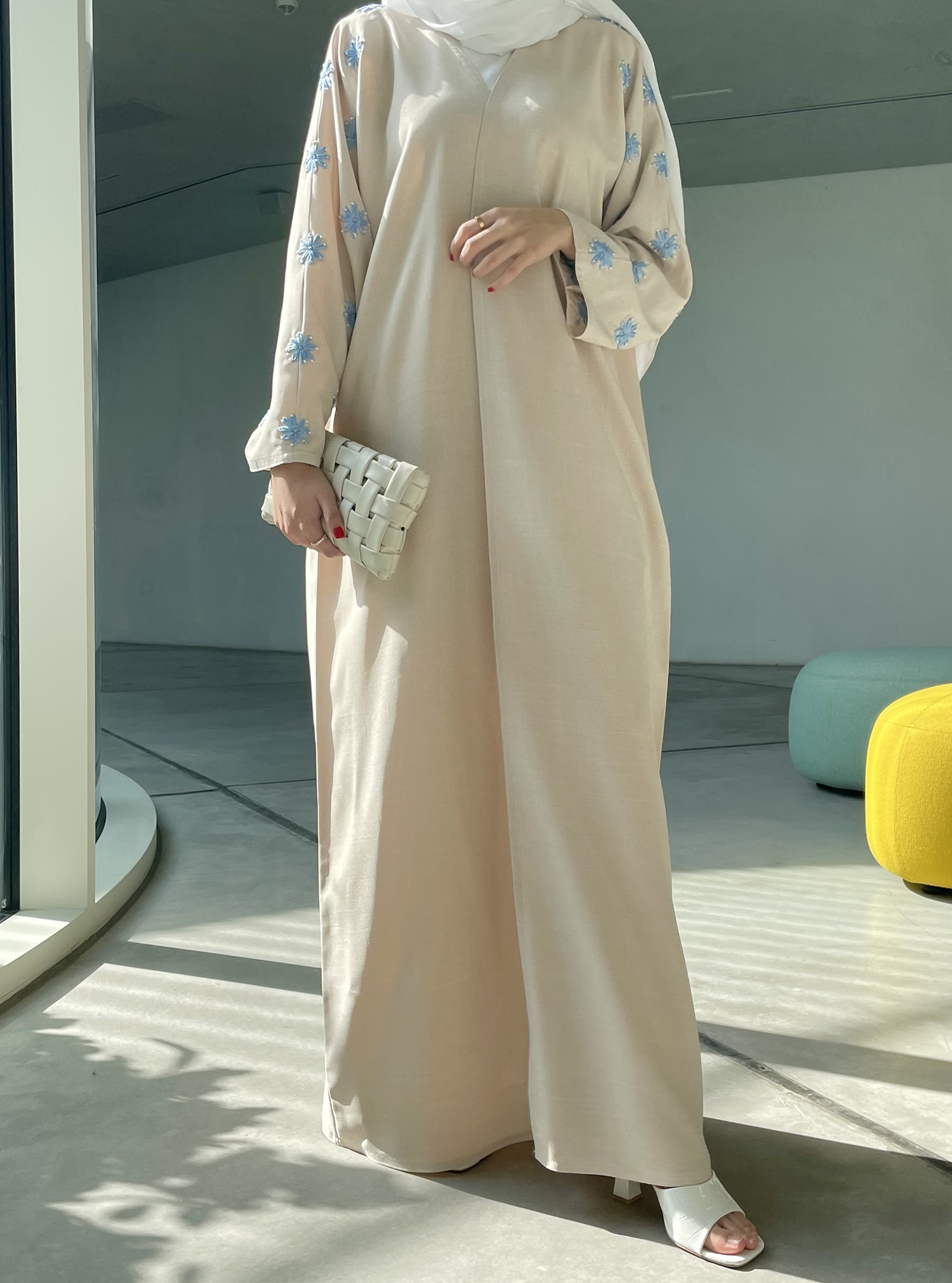 S017 linen beige bisht abaya, adorned with floral delicate baby blue ...