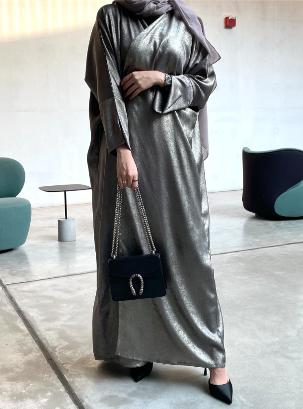 S027 Abaya Experience timeless charm with Sutra’s Shinny grey abaya, Bahraini style abaya with ...