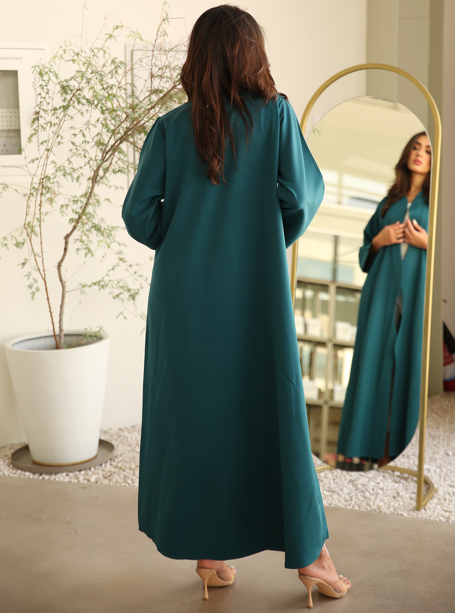 ATS080 Abaya Teal abaya with curved trimming. Comes with a headscarf. Abayas from Altalli at Boksha