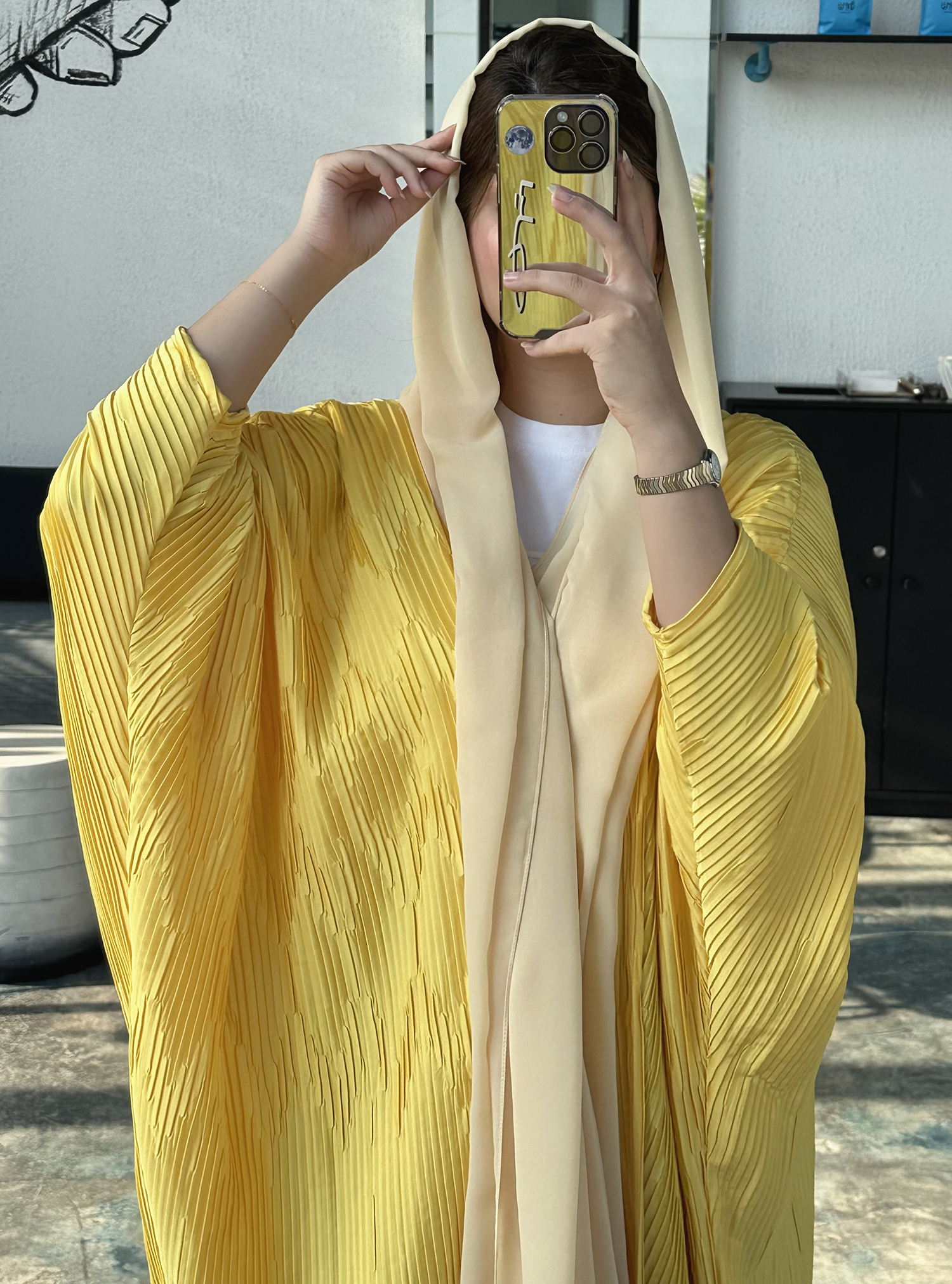 Crushed yellow Crushed yellow bisht abaya with headscarf. Abayas from ...
