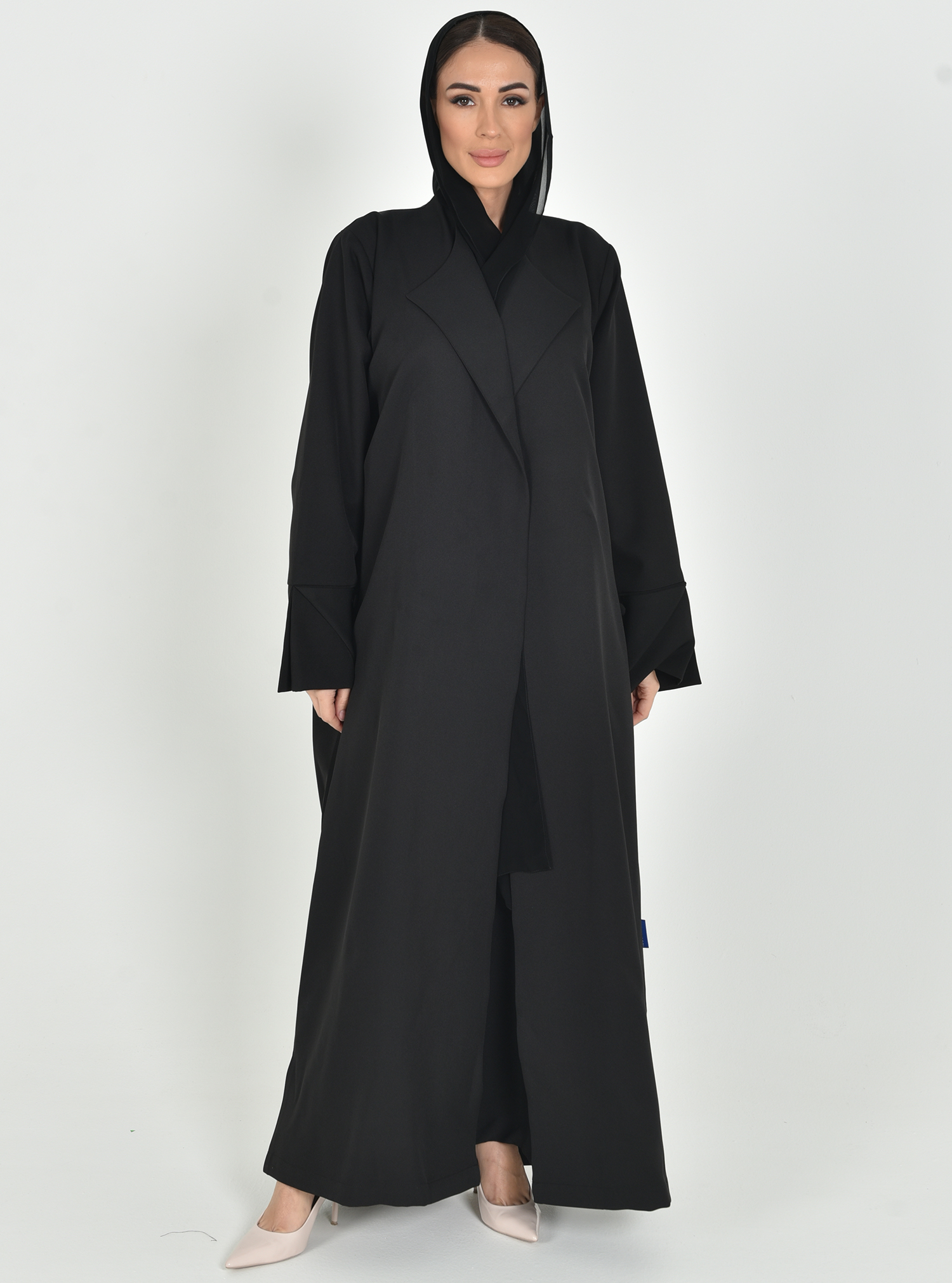 Edge Abaya Black collared abaya with folded sleeve cuff details. Comes ...