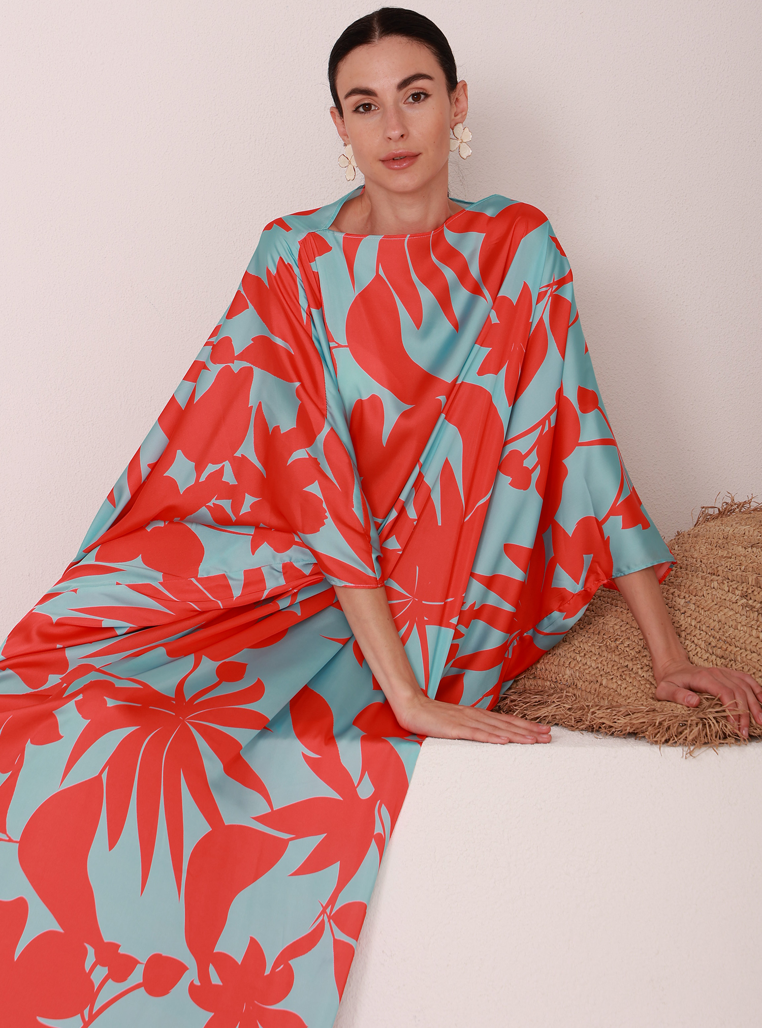 Muhra Kaftan Muhra kaftan features a loose and flowy silhouette, with a straight neckline and ...