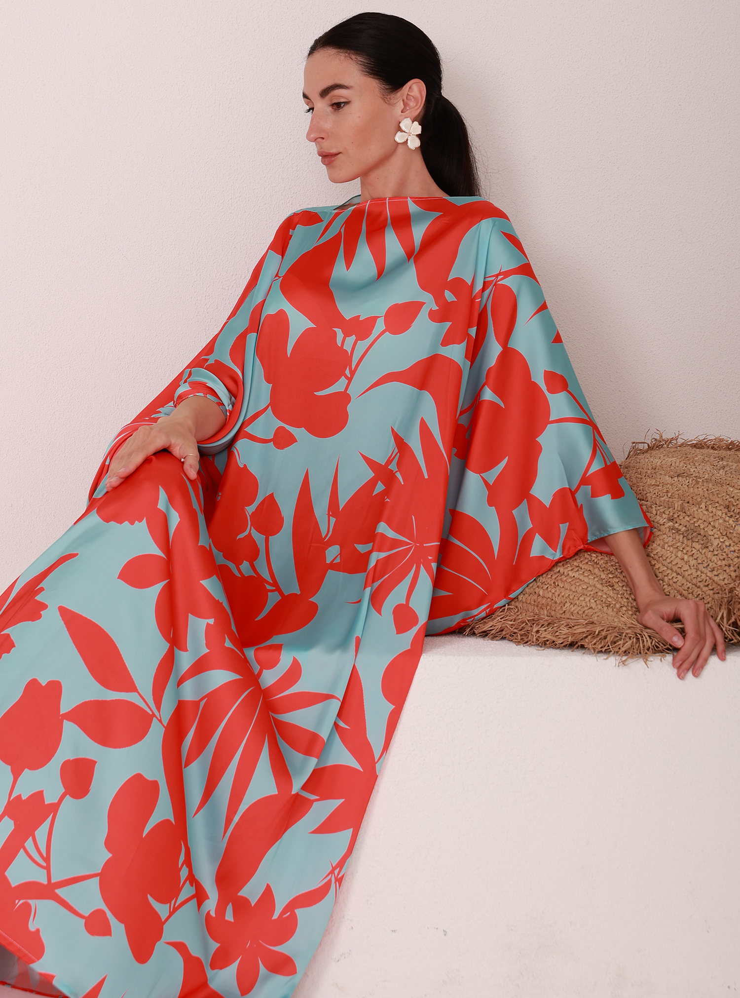 Muhra Kaftan Muhra kaftan features a loose and flowy silhouette, with a straight neckline and ...