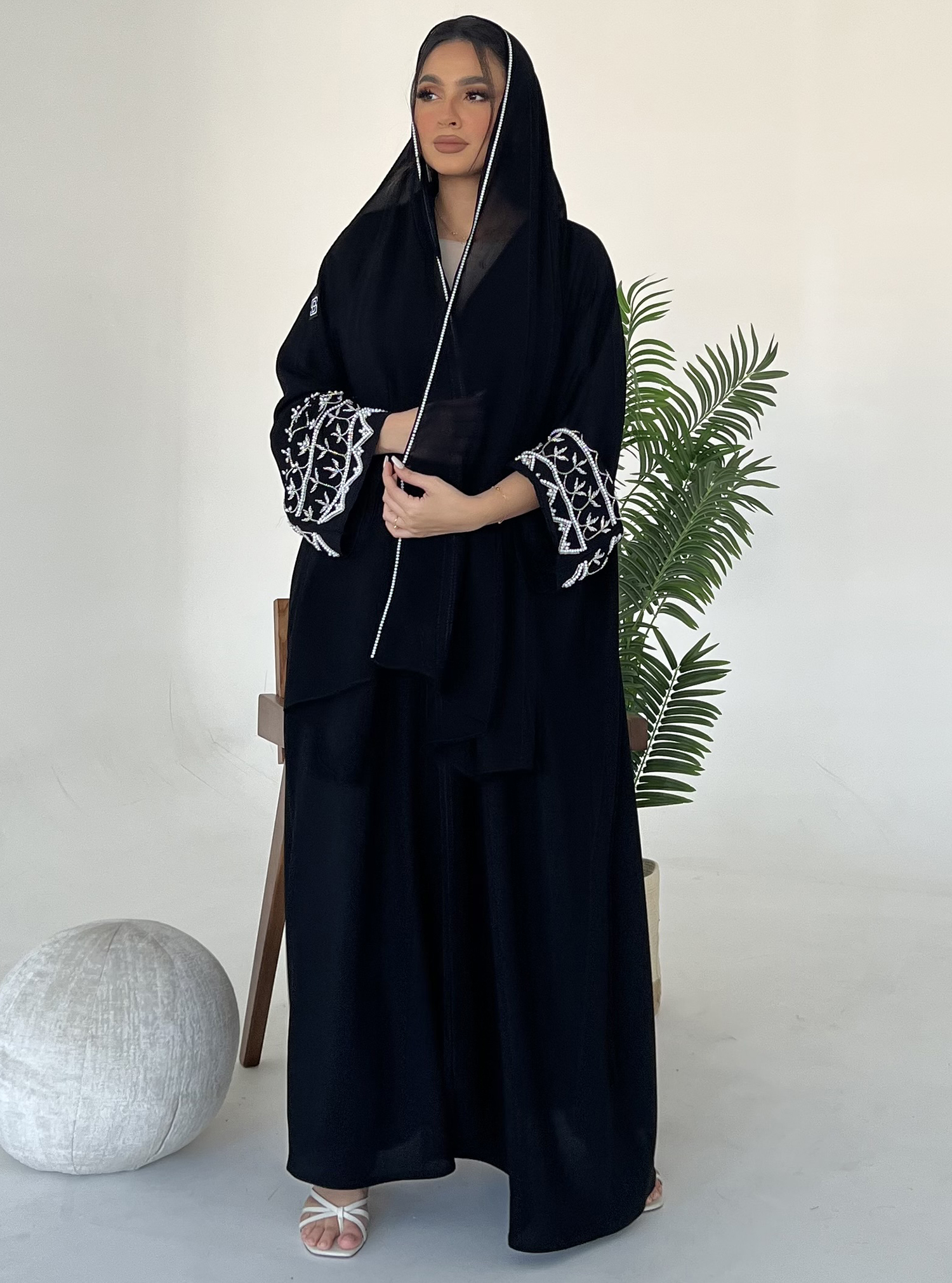 A45 Abaya Black abaya with faux pearl-embellished sleeves. Abayas from ...