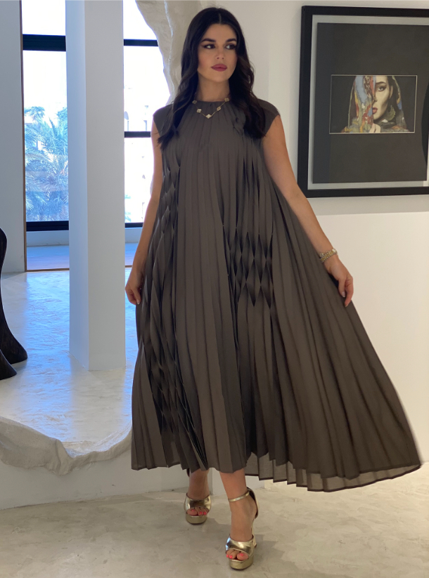 TT52 Abaya An elegant pleated dress with cap sleeves. Dresses from THE THREADZ at Boksha