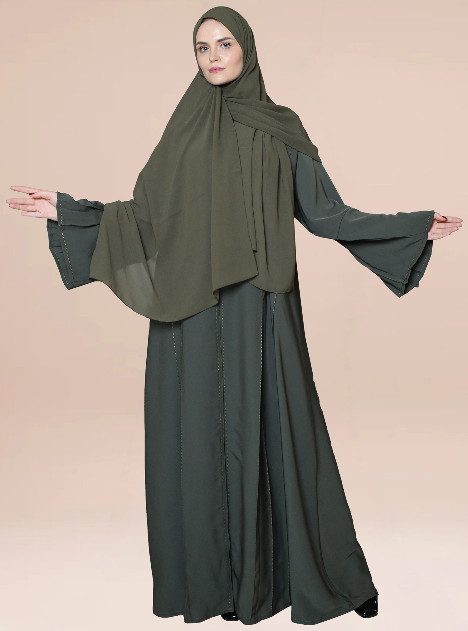 N77A Abaya Beautiful flowy abaya. Comes with matching a headscarf. Abayas from nukhbaa at Boksha