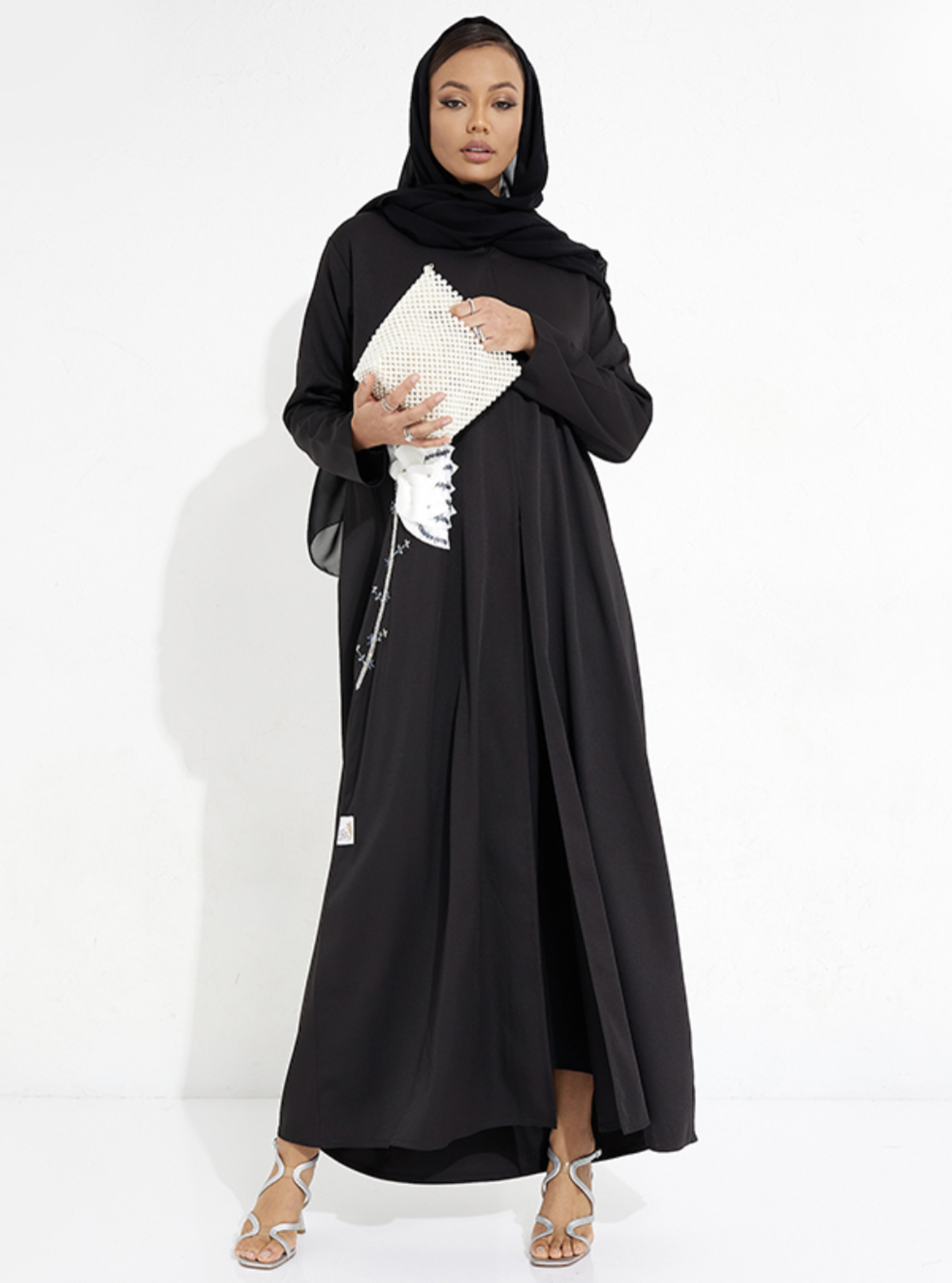 White Prominent A standing cloth abaya embroidered with prominent red ...
