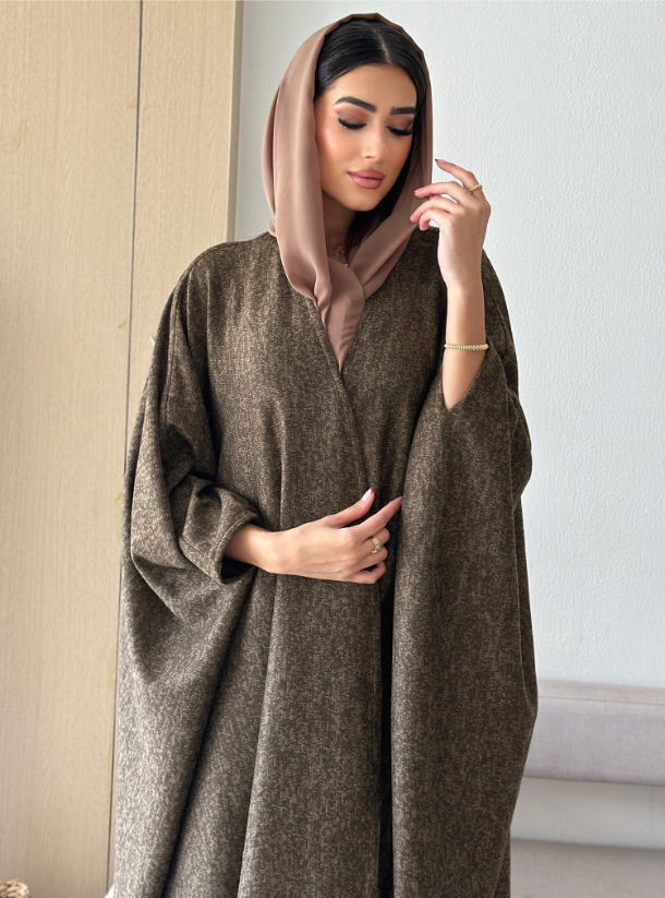 Winter Bisht The Winter Bisht Abaya is a free size, one-piece outfit ...