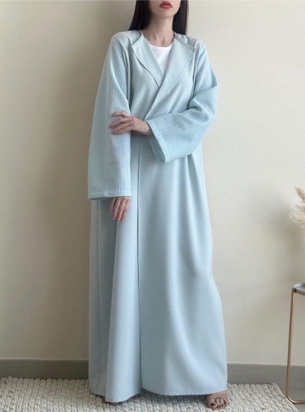 Light blue Light blue abaya with boucle sleeves. Comes with belt Abayas ...