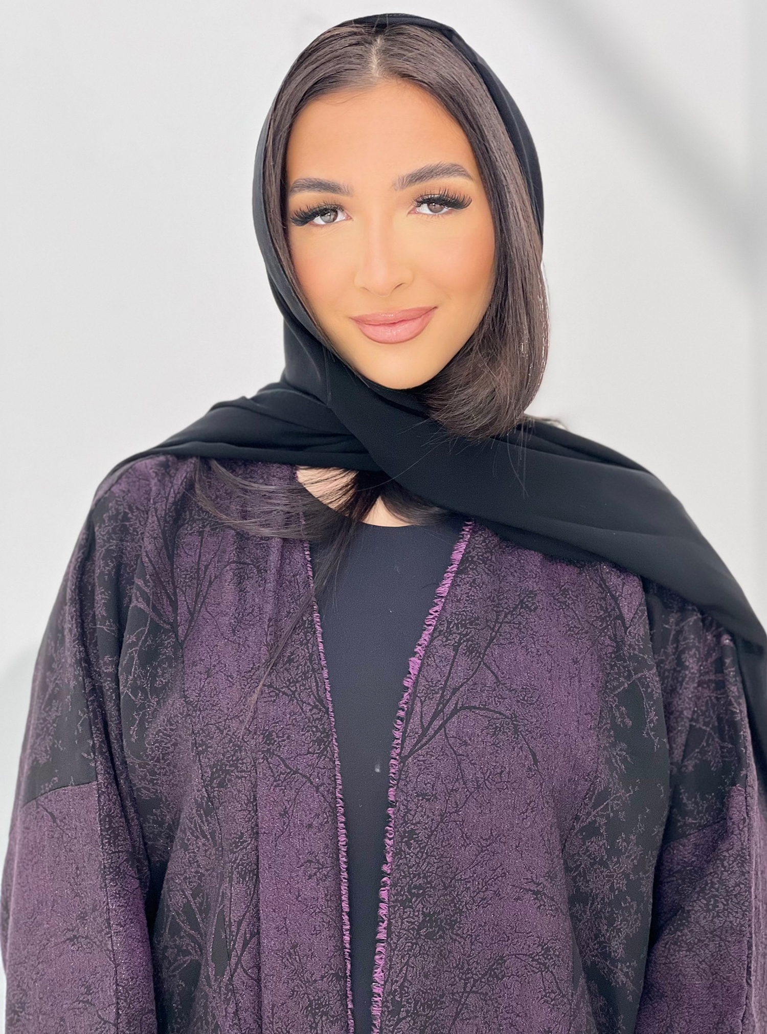 Abaya Cessilia Self pattern contemporary abaya with fringed and feather trimmings. Abayas from ...