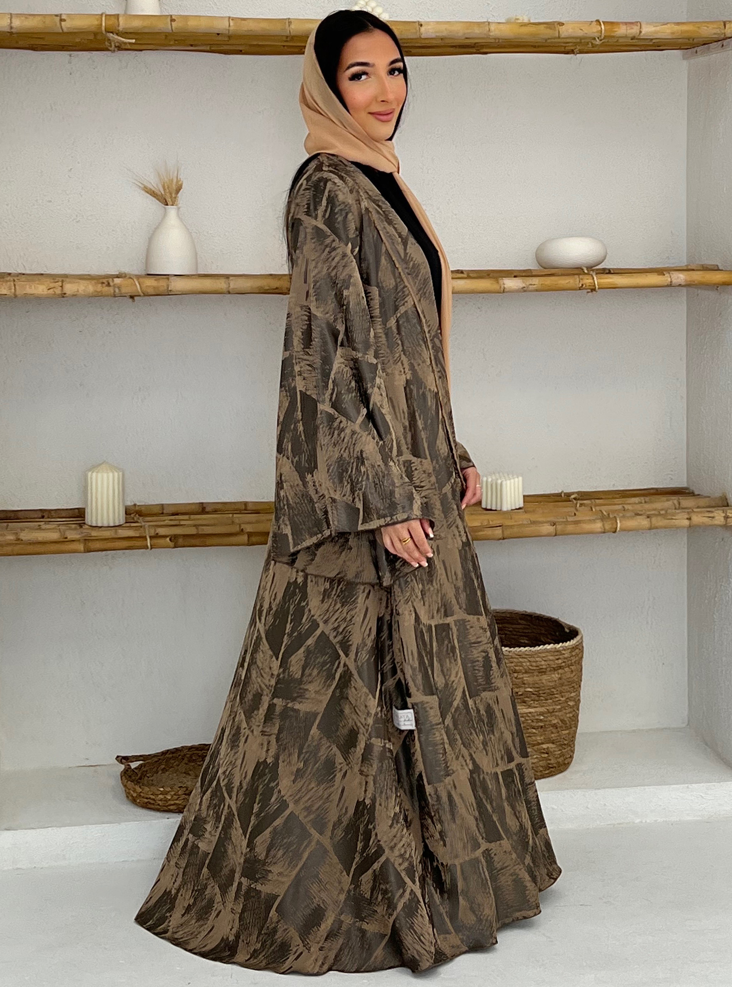 A-line Abaya Self pattern contemporary abaya in an A-line cut with bell sleeves. Abayas from ...