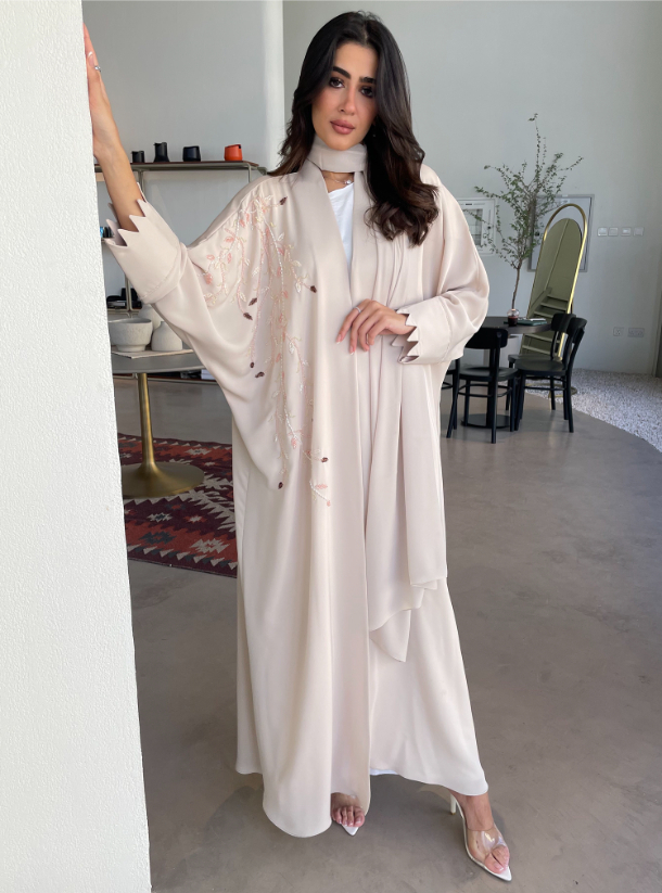S112 Cream white Bisht abaya adorned with colored crystals on the chest ...