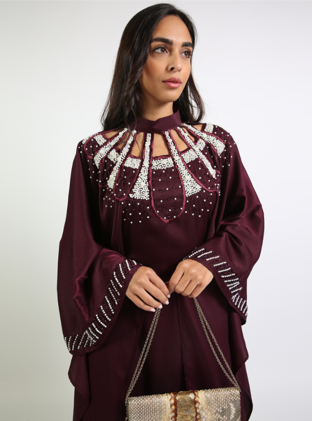 KD2943WN Wine Jalabiya adorned with pearls & crystals. It has a belt ...
