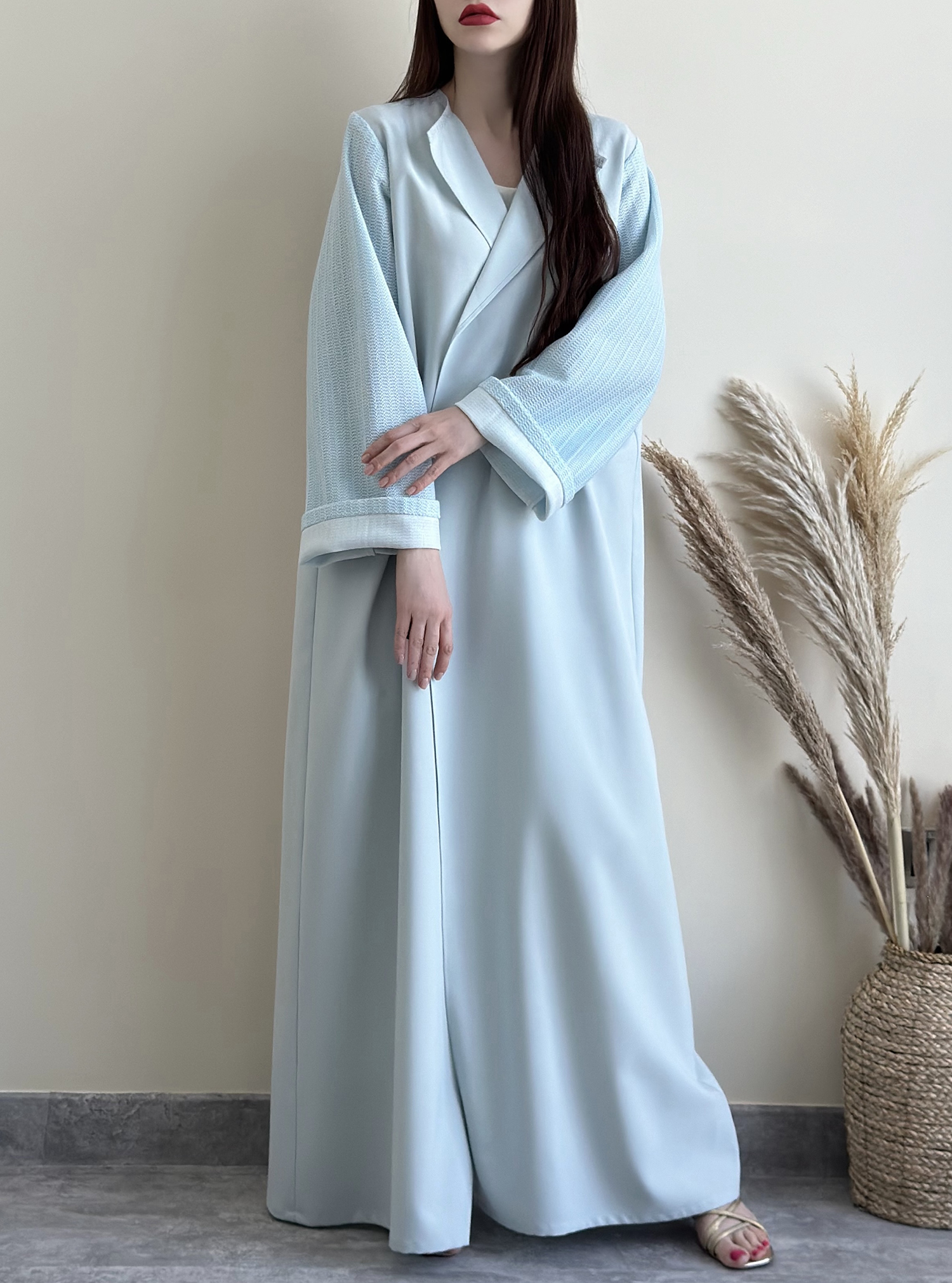 Light blue Light blue abaya with boucle sleeves. Comes with belt Abayas ...