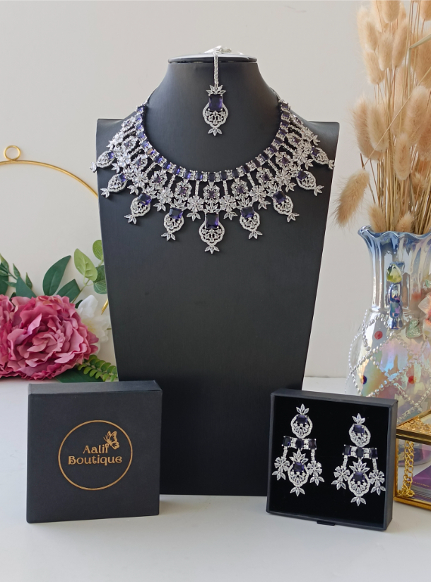 Zircon set Beautiful and delicate purple and white zircon studded ...