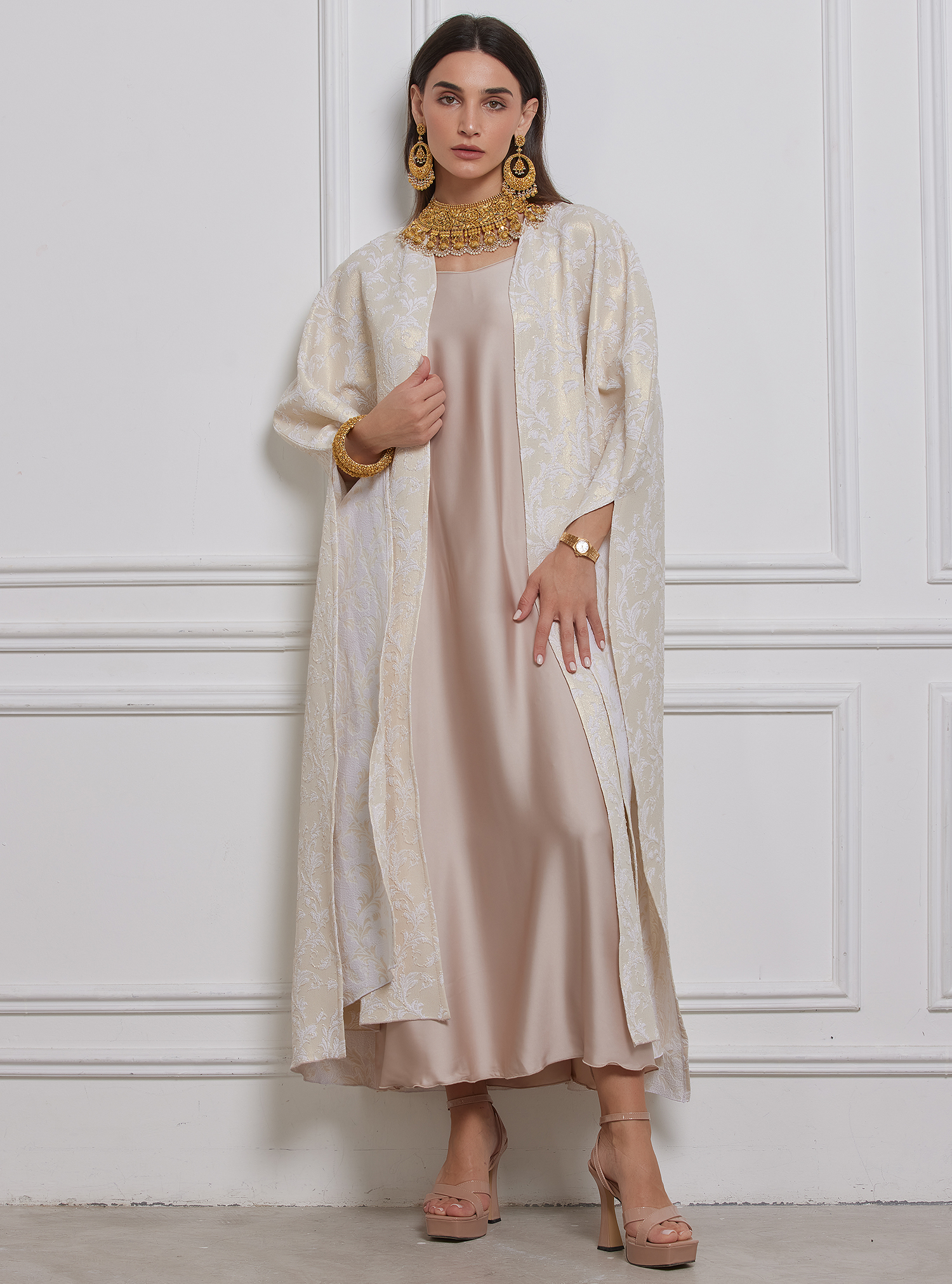 Gold Cape Kafan Pattern Luxury is a luxurious ensemble that combines ...