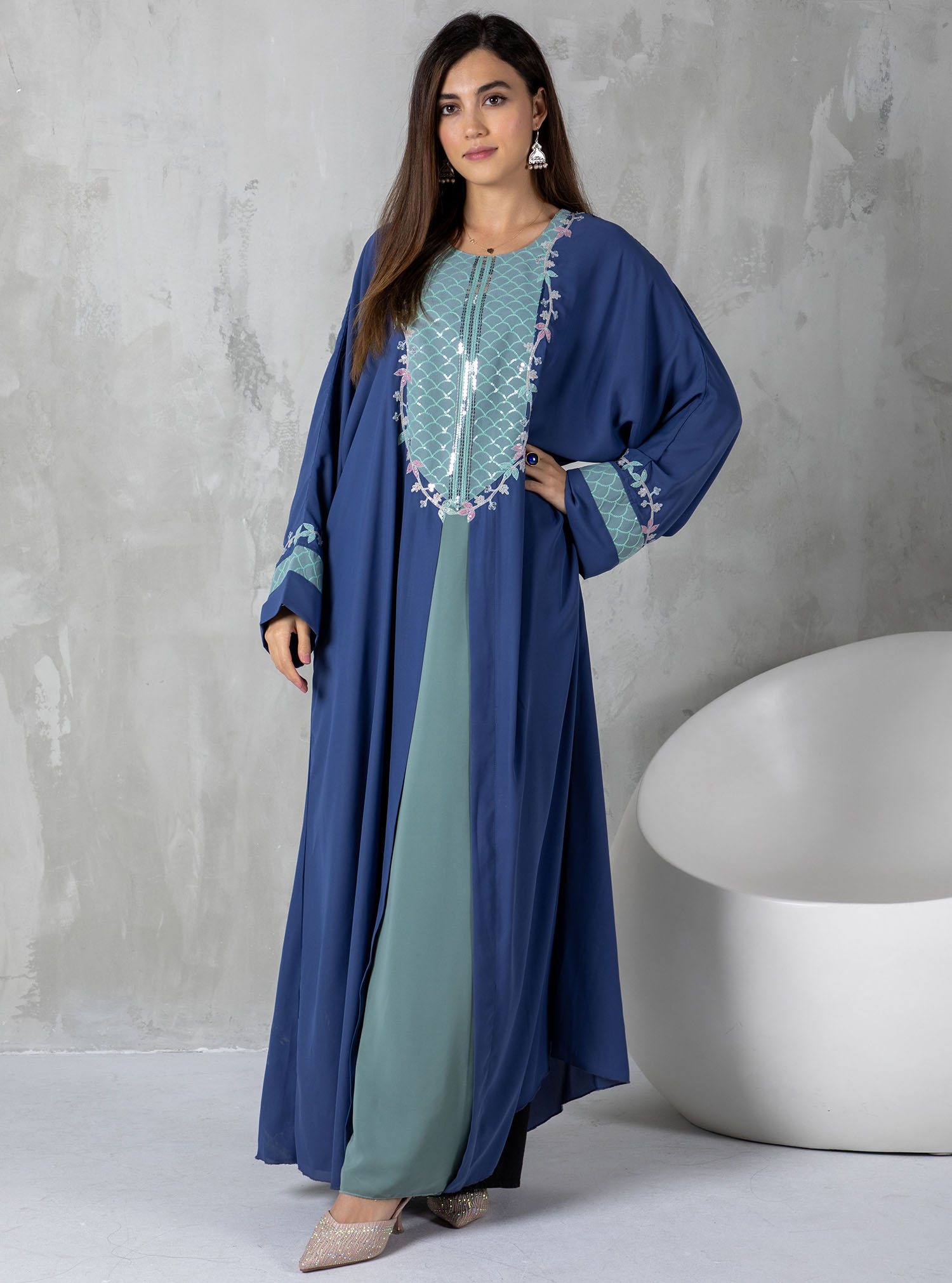 Layer Abayaa Creeper Abaya featuring a Simplistic Feminine Cut with ...