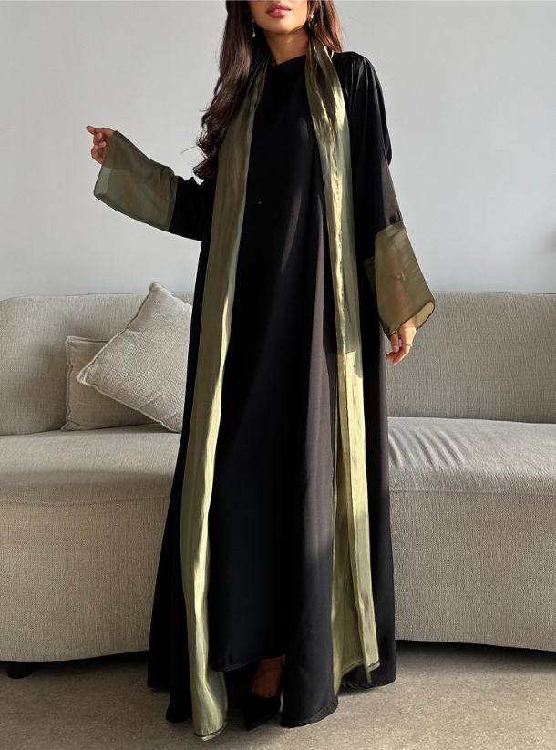 Black Abaya A cool daily abaya made from multiple fabrics in a grassy ...
