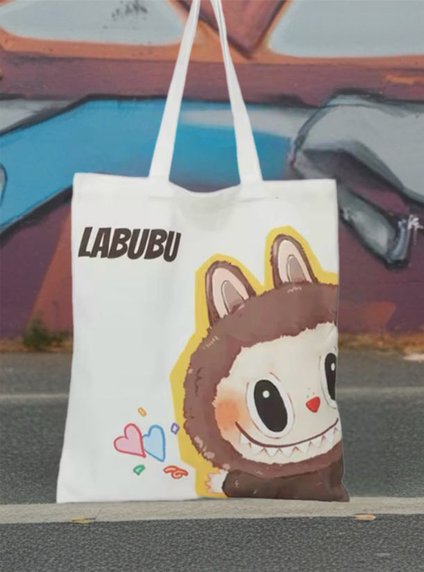 Labubu teto bag This is a small tote bag featuring characters from the ...
